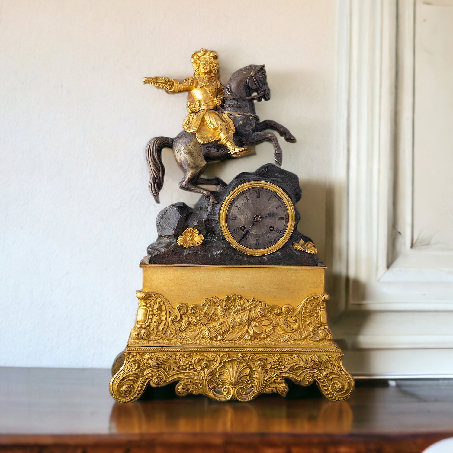 Mantel clock topped with a figure of Louis XIV on horseback, second ...